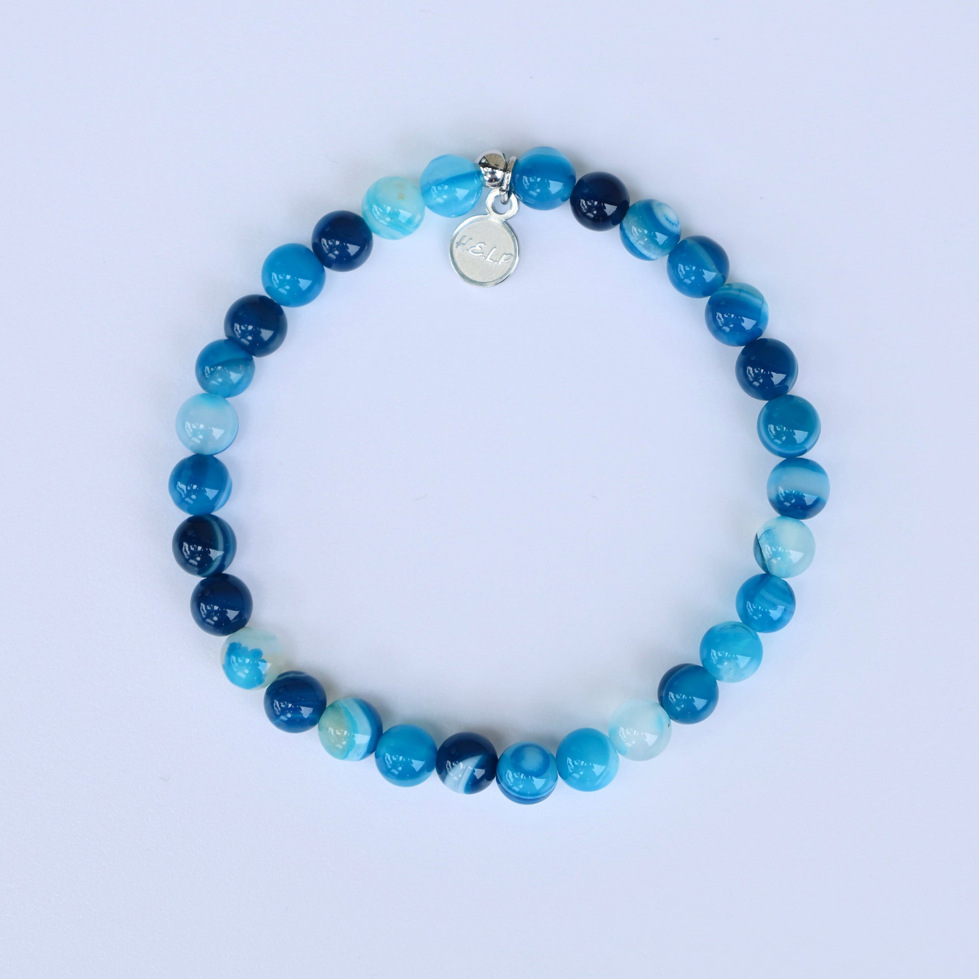 HELP Charity Bracelets – HELP by TJ