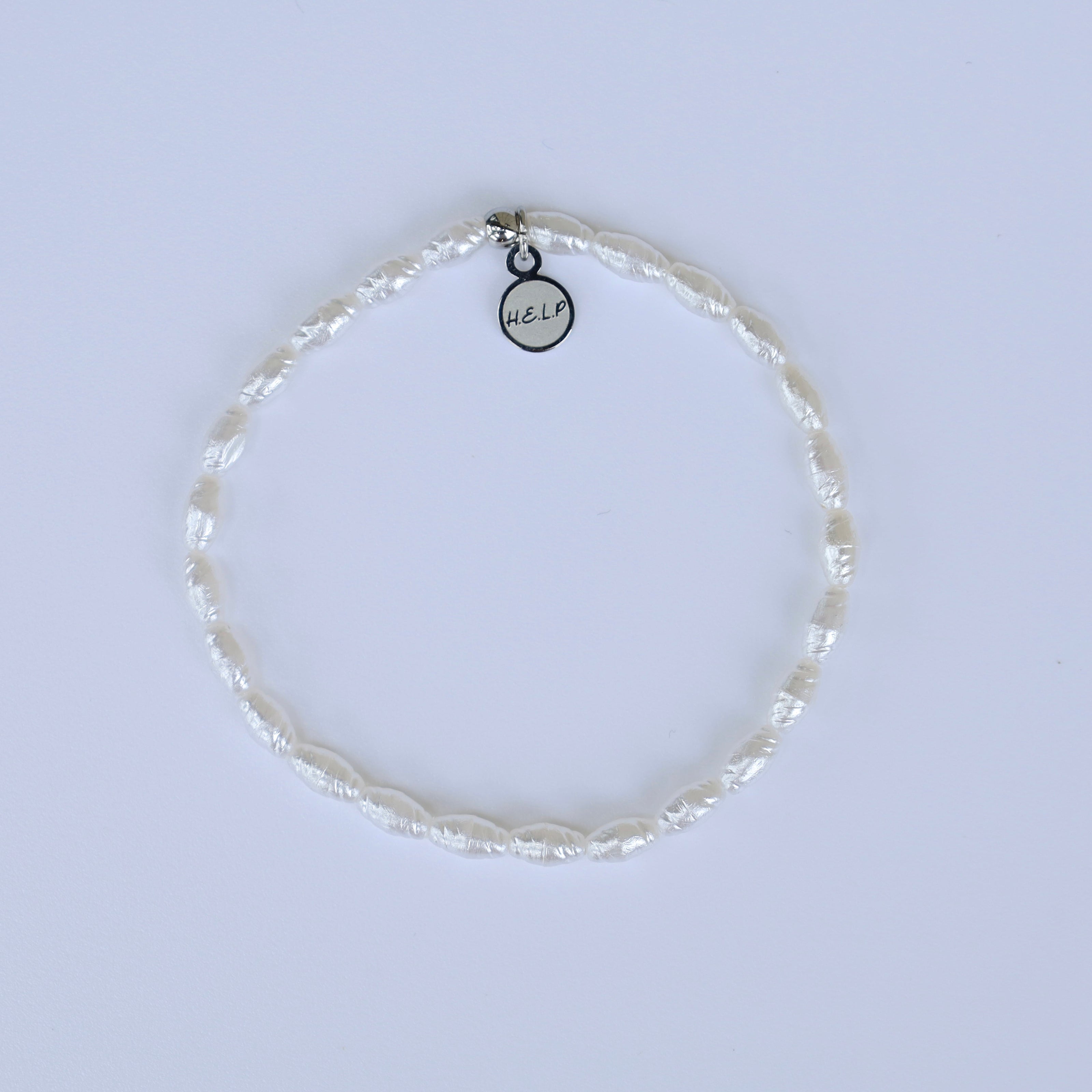 HELP Charity Bracelets – HELP by TJ